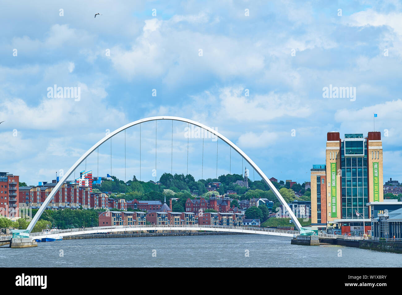 Millennium bridge, pedestrian and cyclist tilt bridge over the river ...