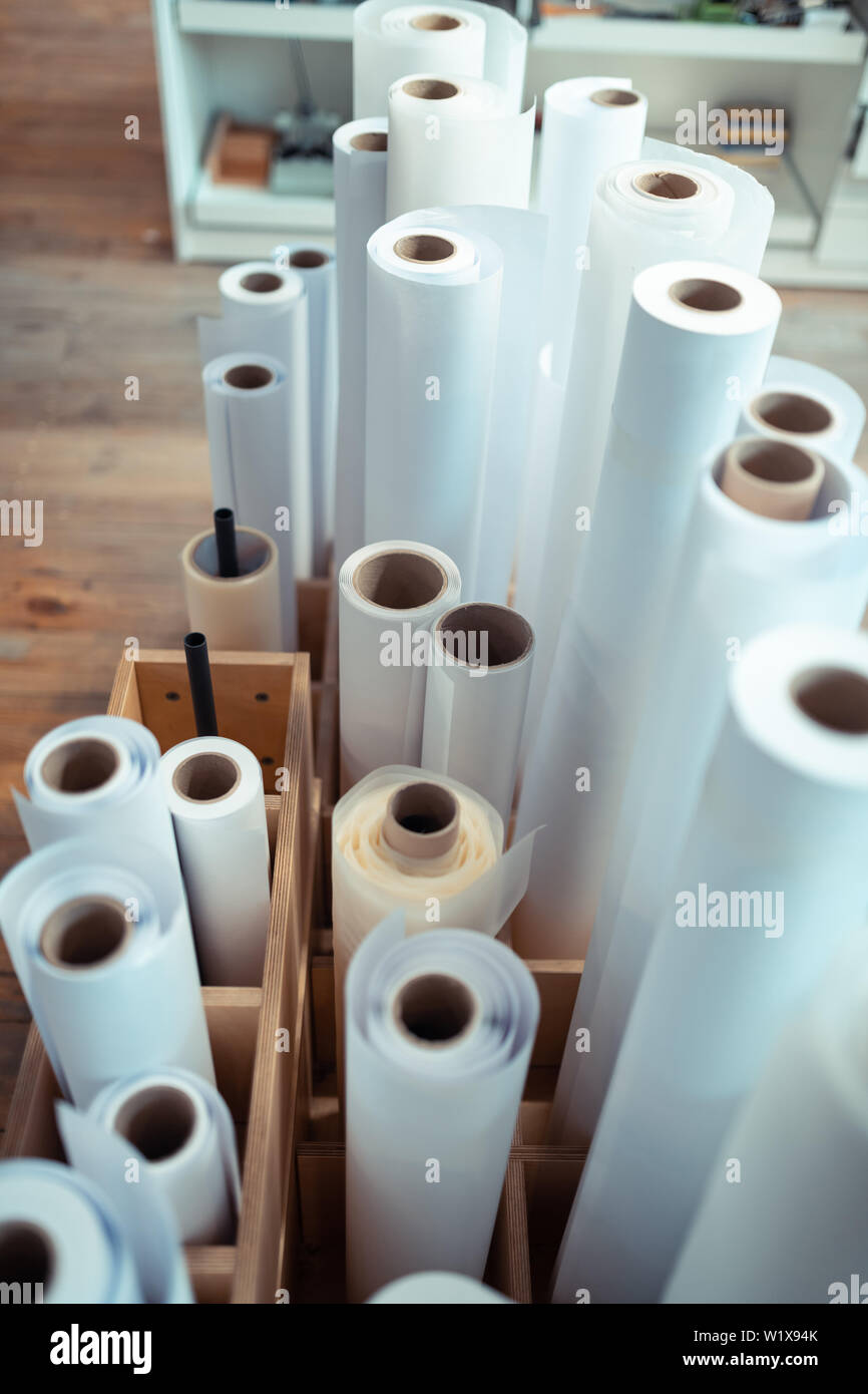 Paper rolls. Top view of paper rolls for manufacturing books standing ...