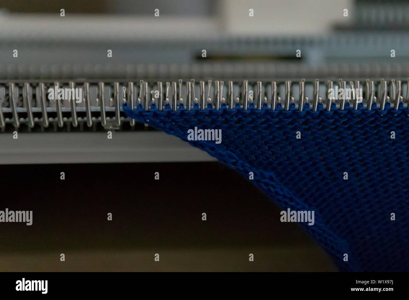 Manual knitting machine. A knitting machine is a device used to create ...