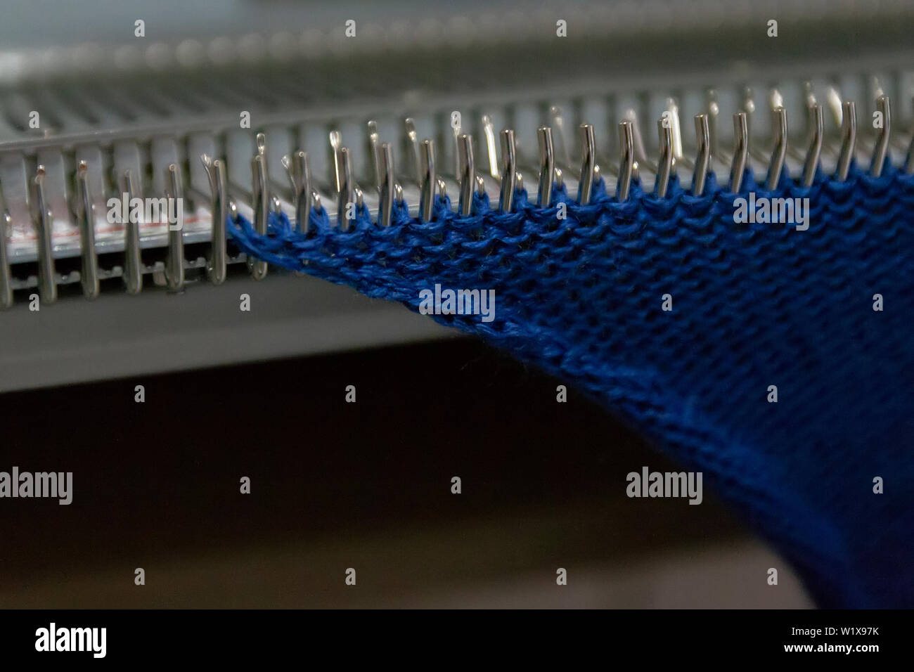 Manual knitting machine. A knitting machine is a device used to create ...