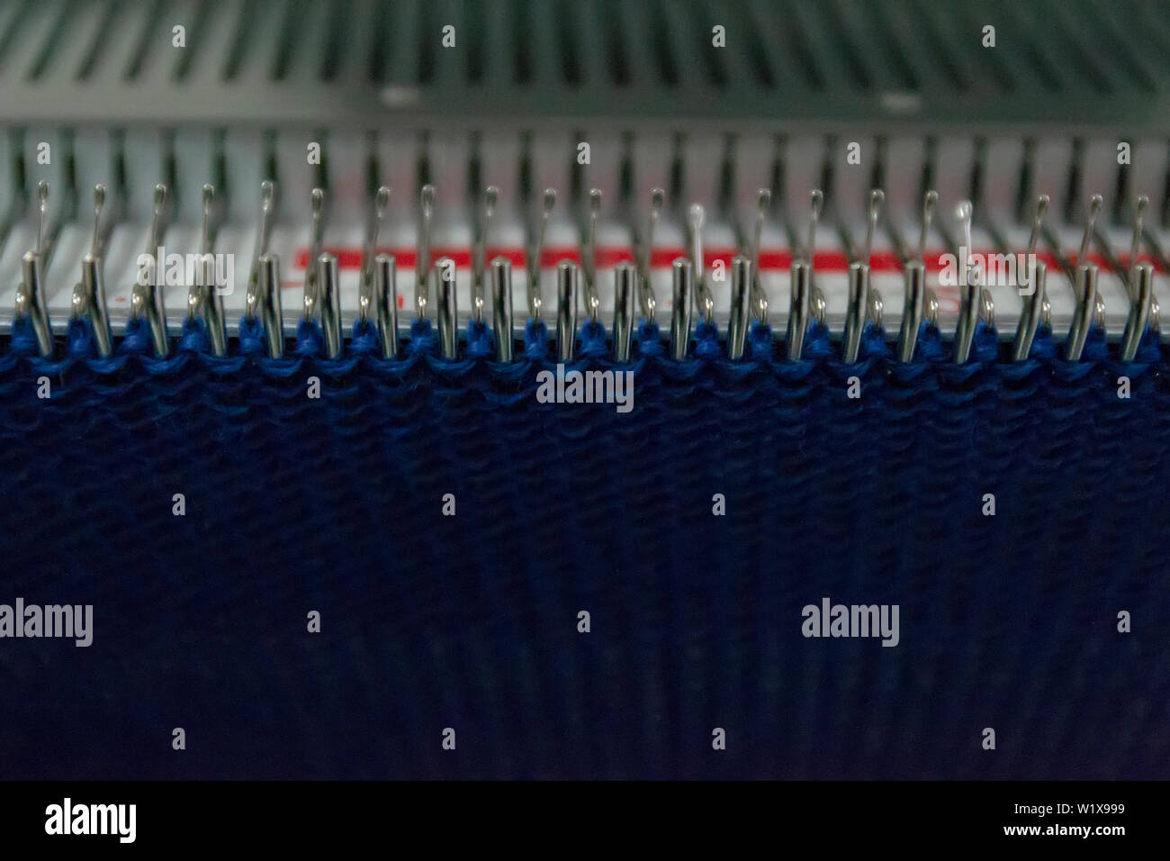 Manual knitting machine. A knitting machine is a device used to create ...