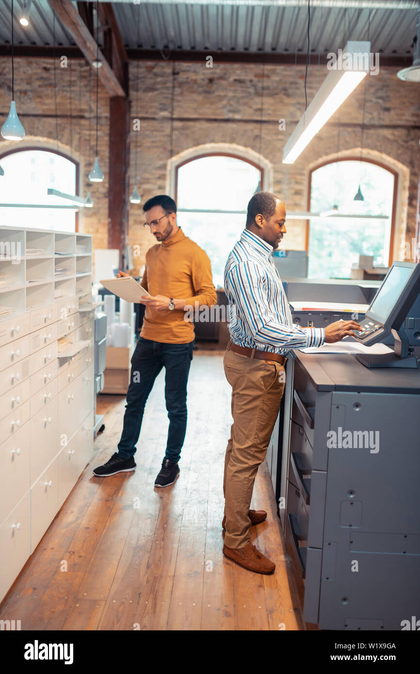 Two concentrated mature men hi-res stock photography and images - Alamy