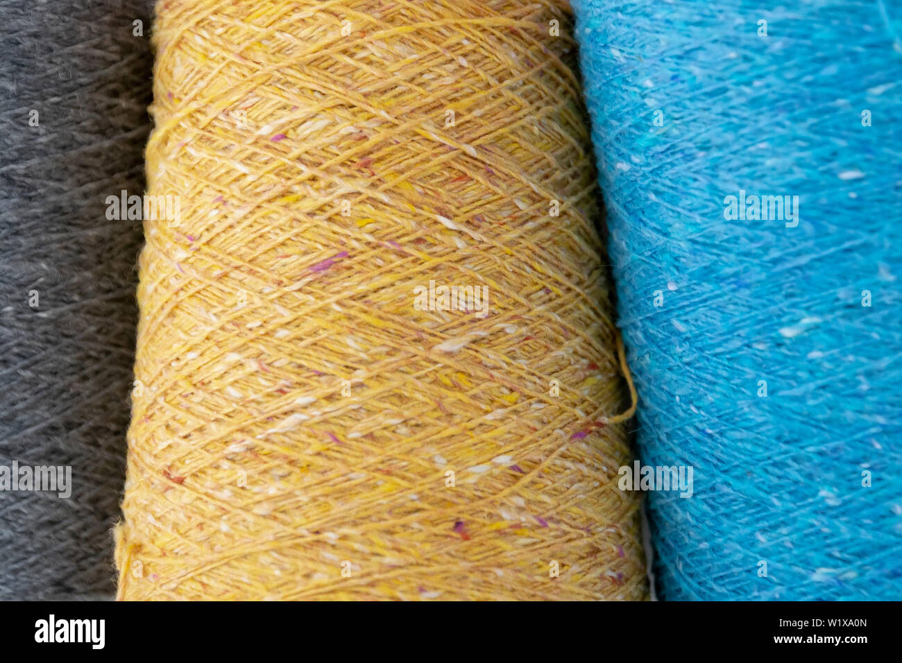 Multi-colored bobbins of wool yarn for hand and machine knitting Stock ...