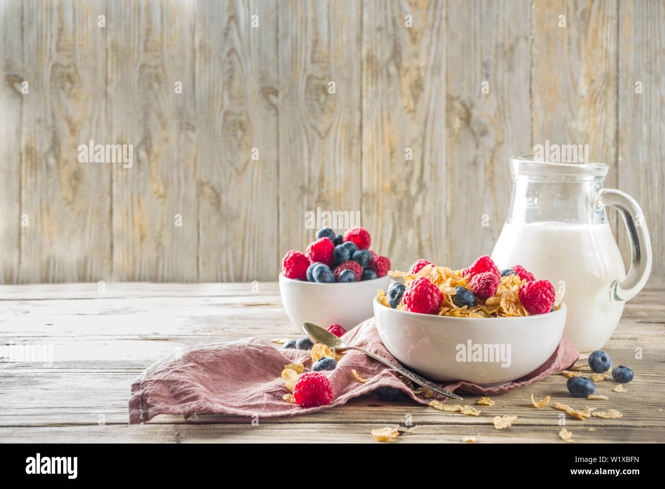 Healthy Corn Flakes for Breakfast with Milk and fresh summer berries ...