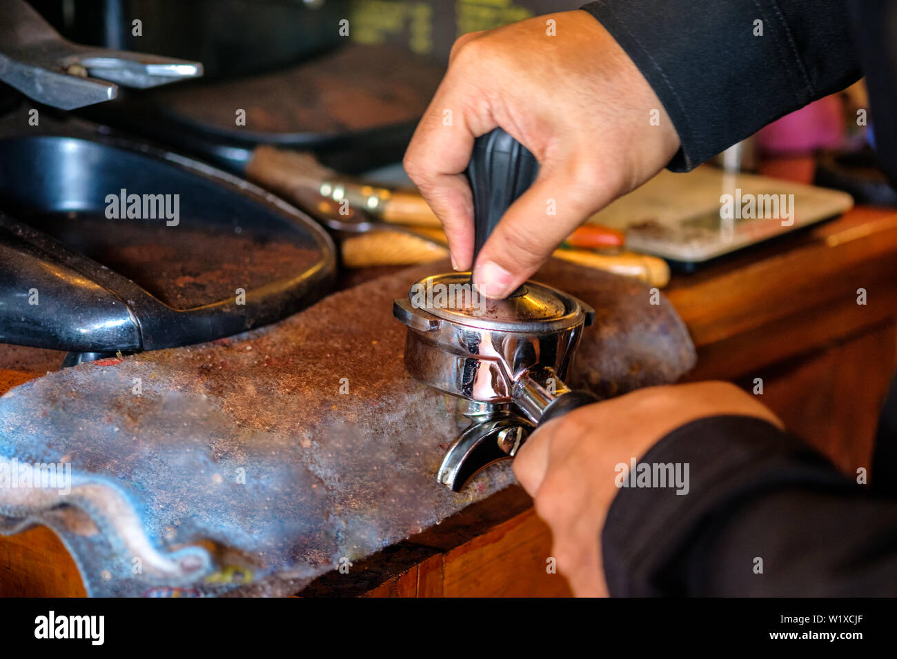Man hand coffee grinder in hi-res stock photography and images - Alamy