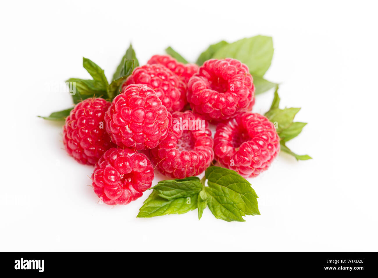 Raspberry with leaves isolated on white background Stock Photo - Alamy
