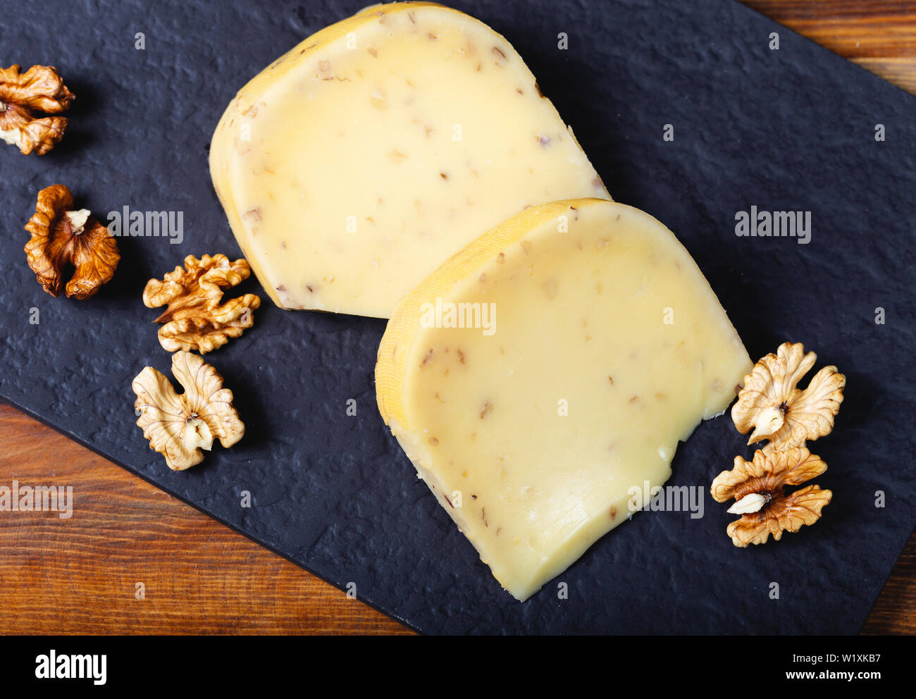 Delicious gouda cheese with walnut Stock Photo - Alamy