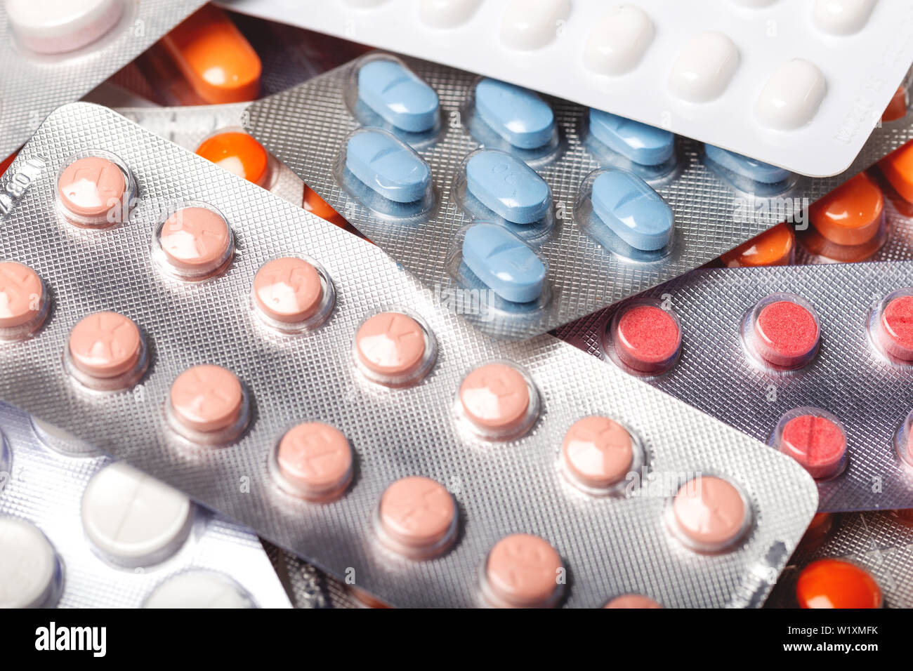 Heap of colorful round capsule in stick pills, background Stock Photo ...