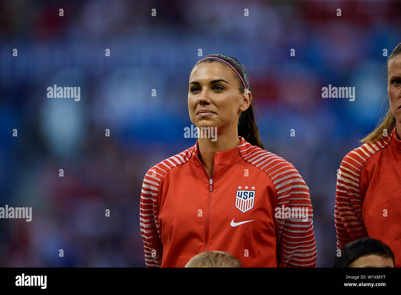 LYON, FRANCE - JULY 02: Alex Morgan of the USA sing the national anthem ...