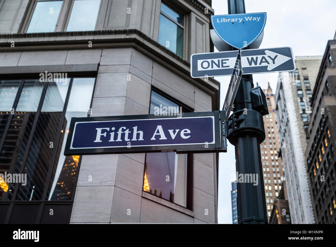 Sign of the 5th Avenue (Fifth Avenue) with modern skyscrapers in ...