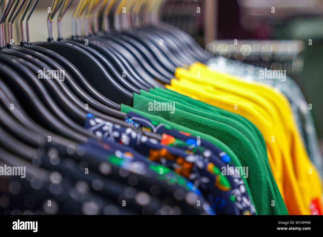 Variety sweaters brand name hang on to the hanger in the fashion cloth ...