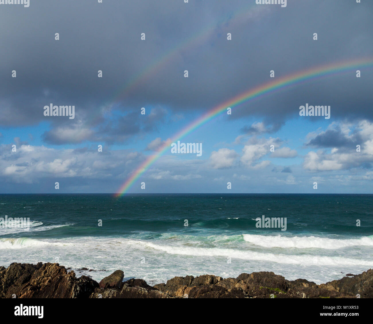 Double Rainbow over the ocean by the beach, twice as nice Stock Photo ...