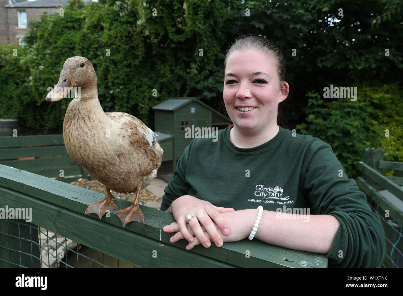 Keeper Maia Gordon with Olive the duck after Queen Elizabeth II visited ...