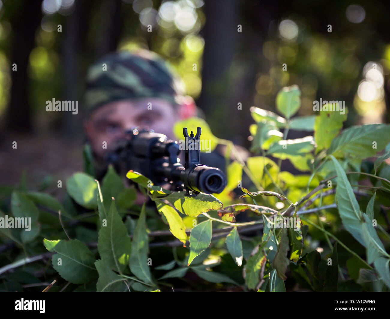 soldier shooting from a Kalashnikov ambush Stock Photo - Alamy