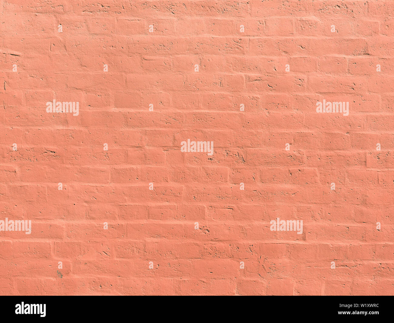 old pink brick wall as background Stock Photo - Alamy