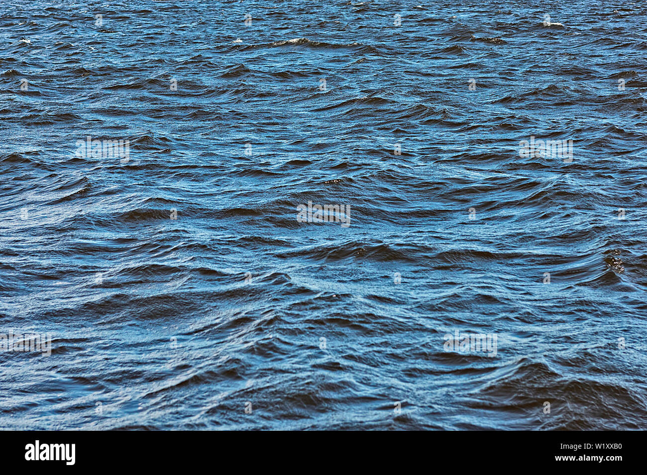 waves on the river close-up as background Stock Photo - Alamy