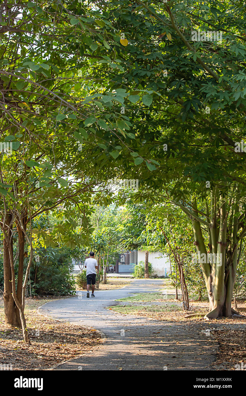 Man running exercise for health in the BangYai park , Nonthaburi in ...
