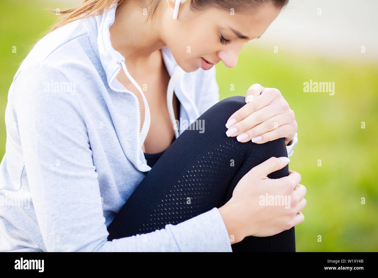 Leg Injury. Woman Suffering From Pain In Leg After Workout Stock Photo ...