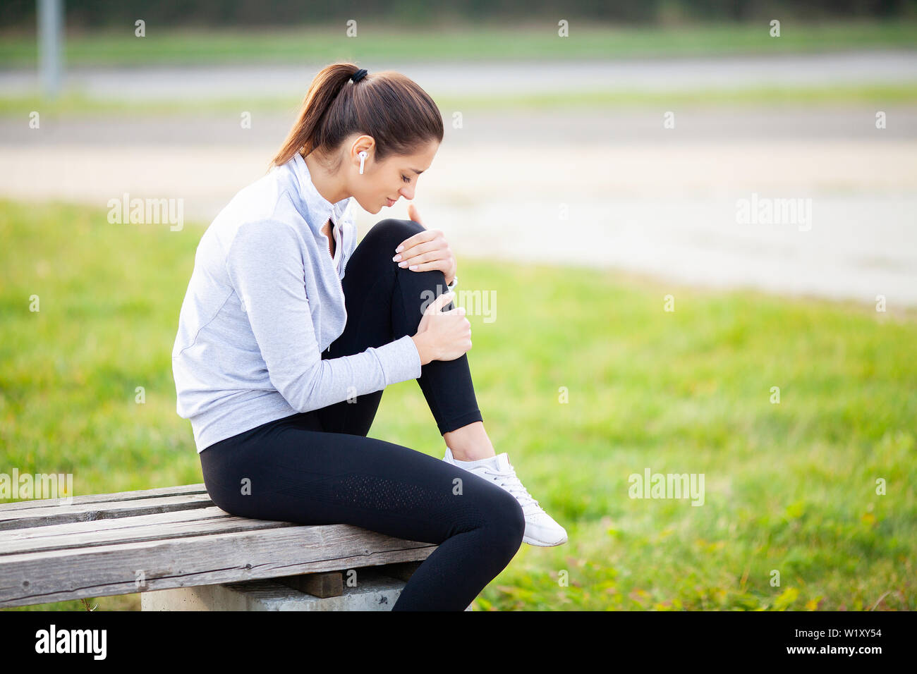 Leg Injury. Woman Suffering From Pain In Leg After Workout Stock Photo ...