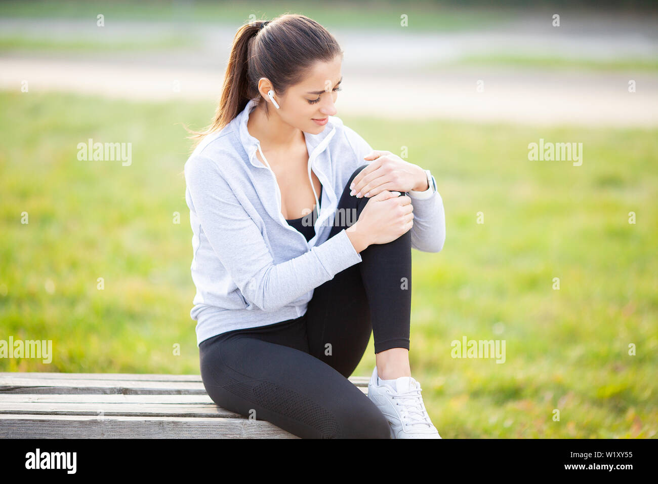 Leg Injury. Woman Suffering From Pain In Leg After Workout Stock Photo ...