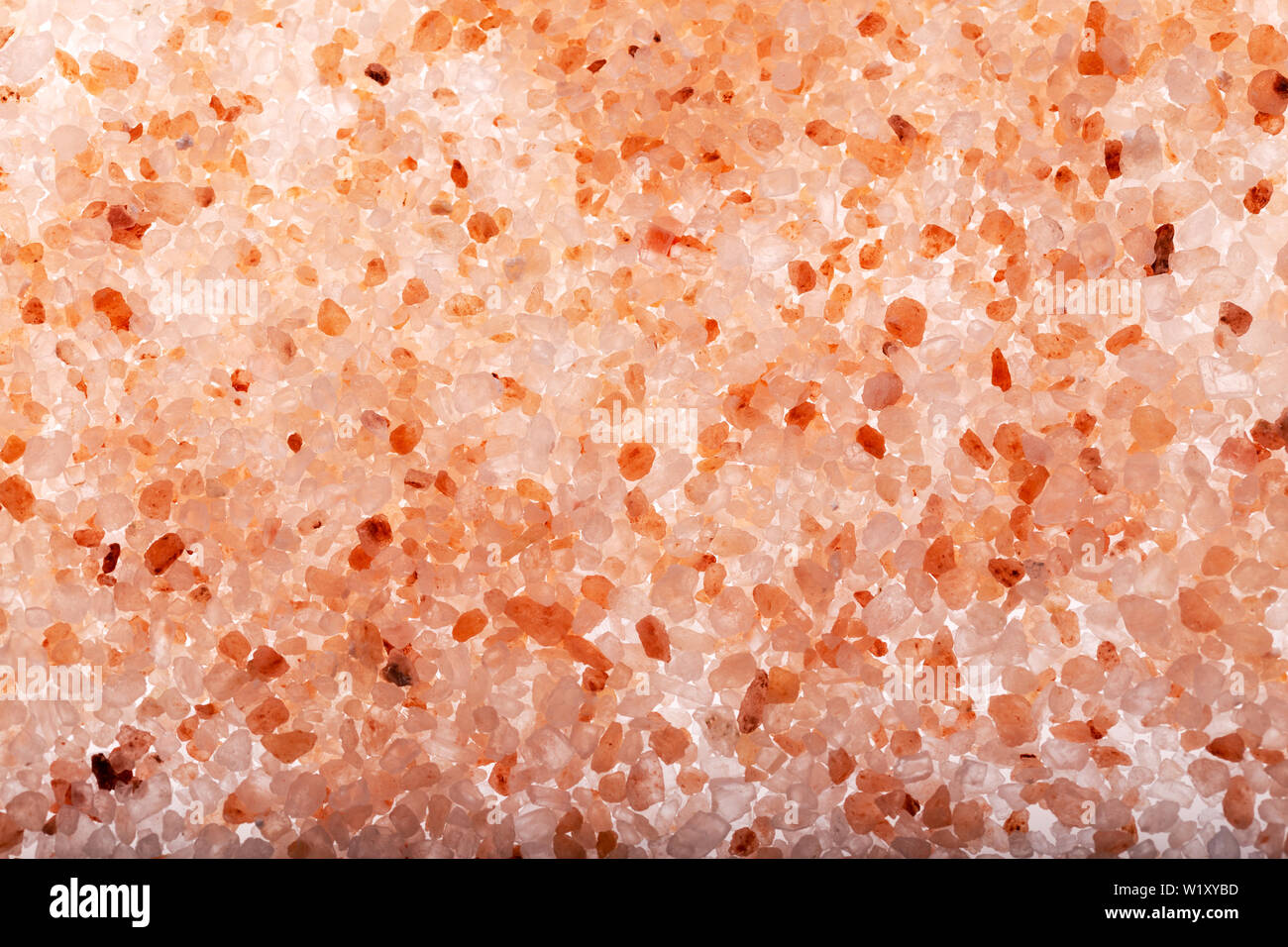 Pink himalayan salt on white background Stock Photo - Alamy