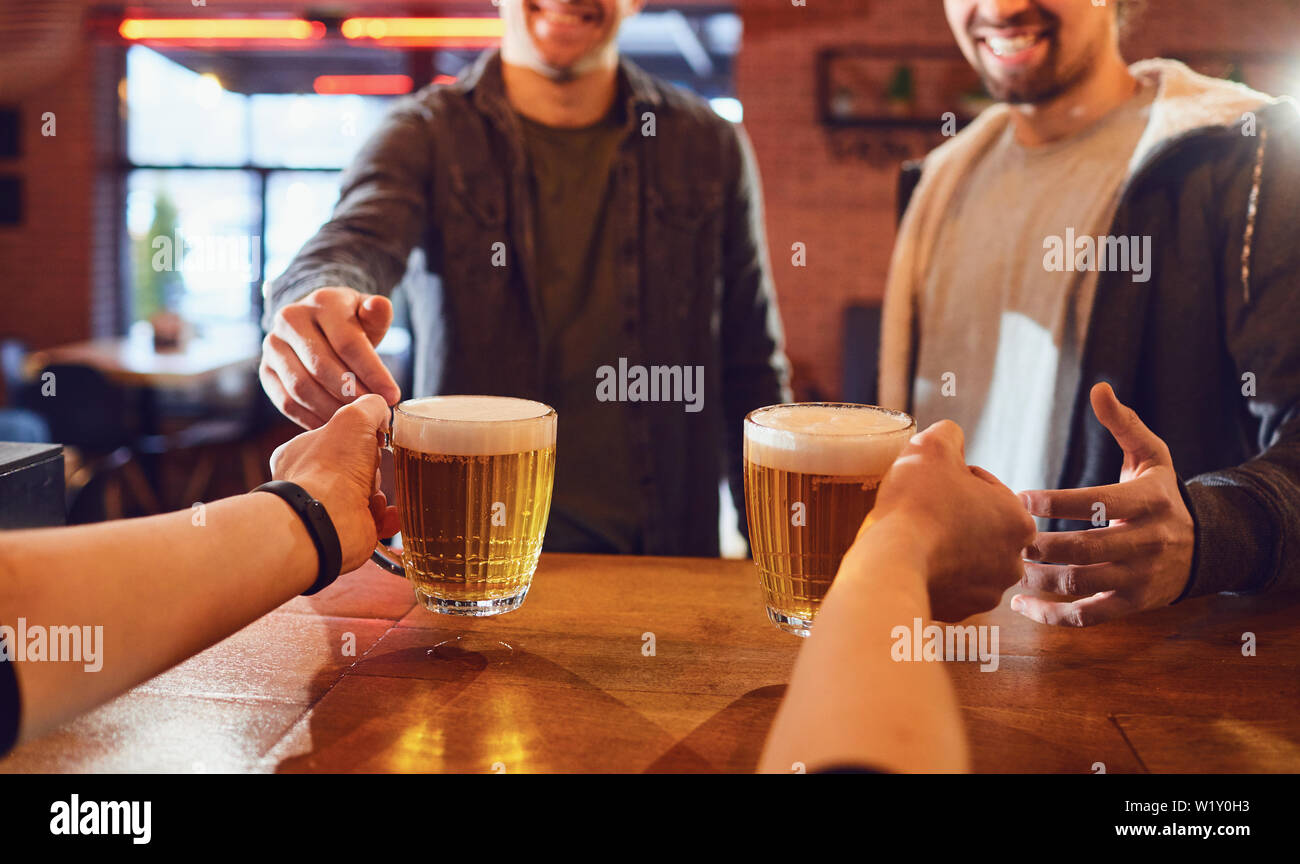 Two mugs hands hi-res stock photography and images - Alamy