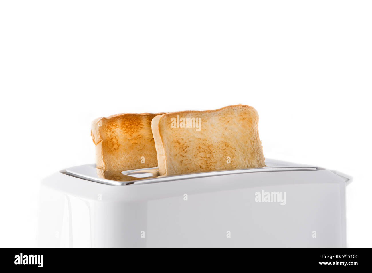 Toasted toast bread in white toaster isolated on white background Stock ...