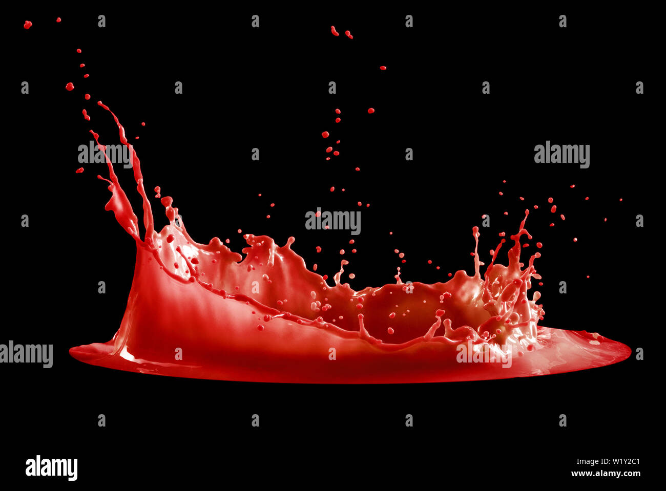 red paint splash isolated on black background Stock Photo - Alamy