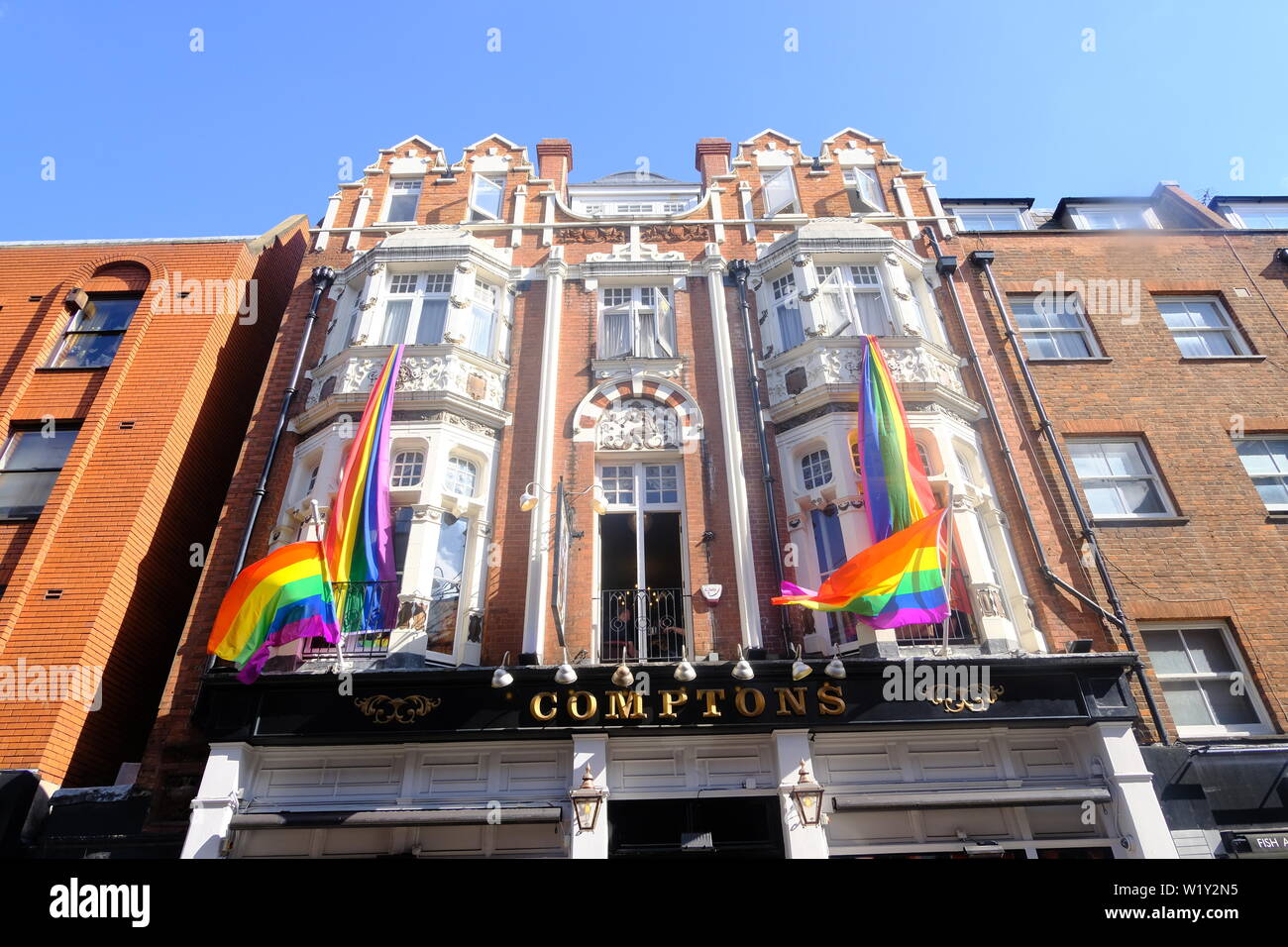 Rainbow flags soho hi-res stock photography and images - Alamy
