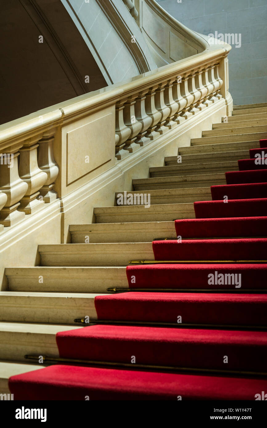 Interior with elegant stairs and red carpet, Art and history museum ...