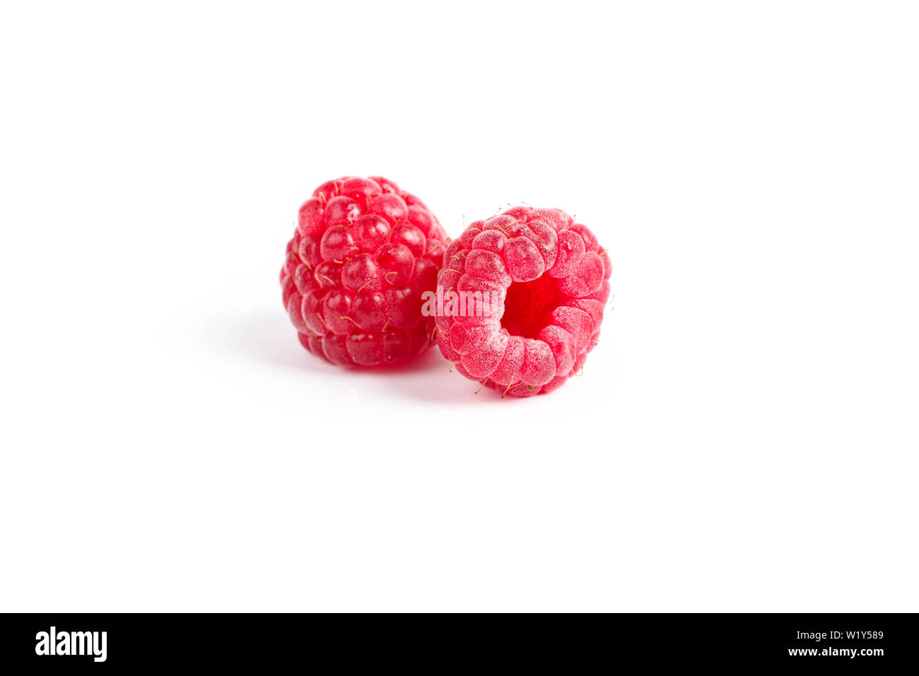 Fresh sweet raspberries isolated on white background Stock Photo - Alamy