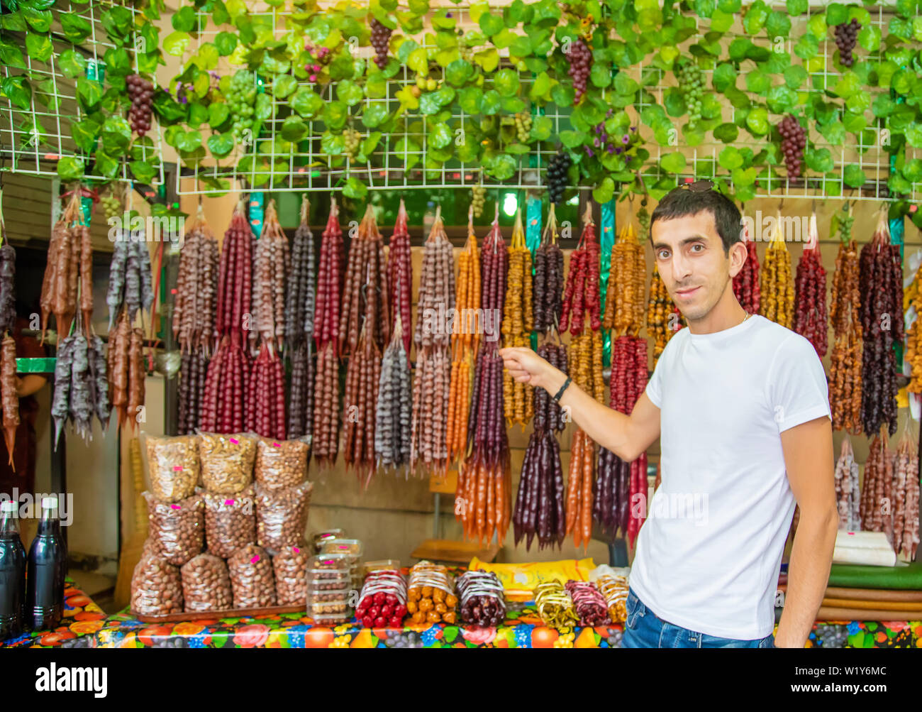 Churchkhela is sold on the Georgian market. Selective focus Stock Photo ...