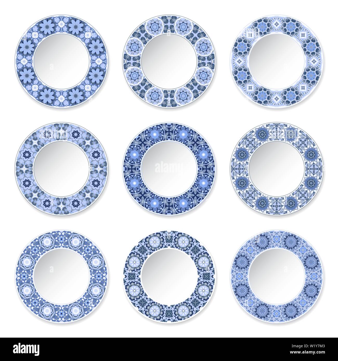 Set of decorative plates with a circular blue pattern, top view. White ...