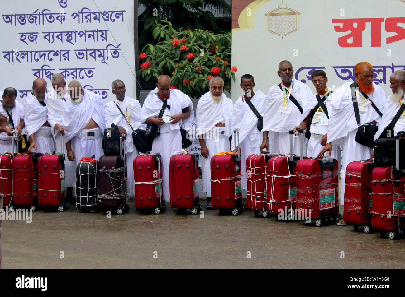 Hajj pilgrims in a queue at the Hazrat Shahjalal International Airport ...