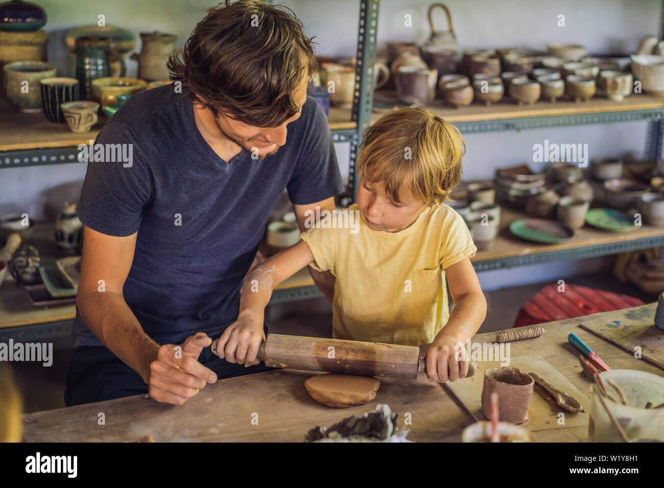Pottery work father son hi-res stock photography and images - Alamy