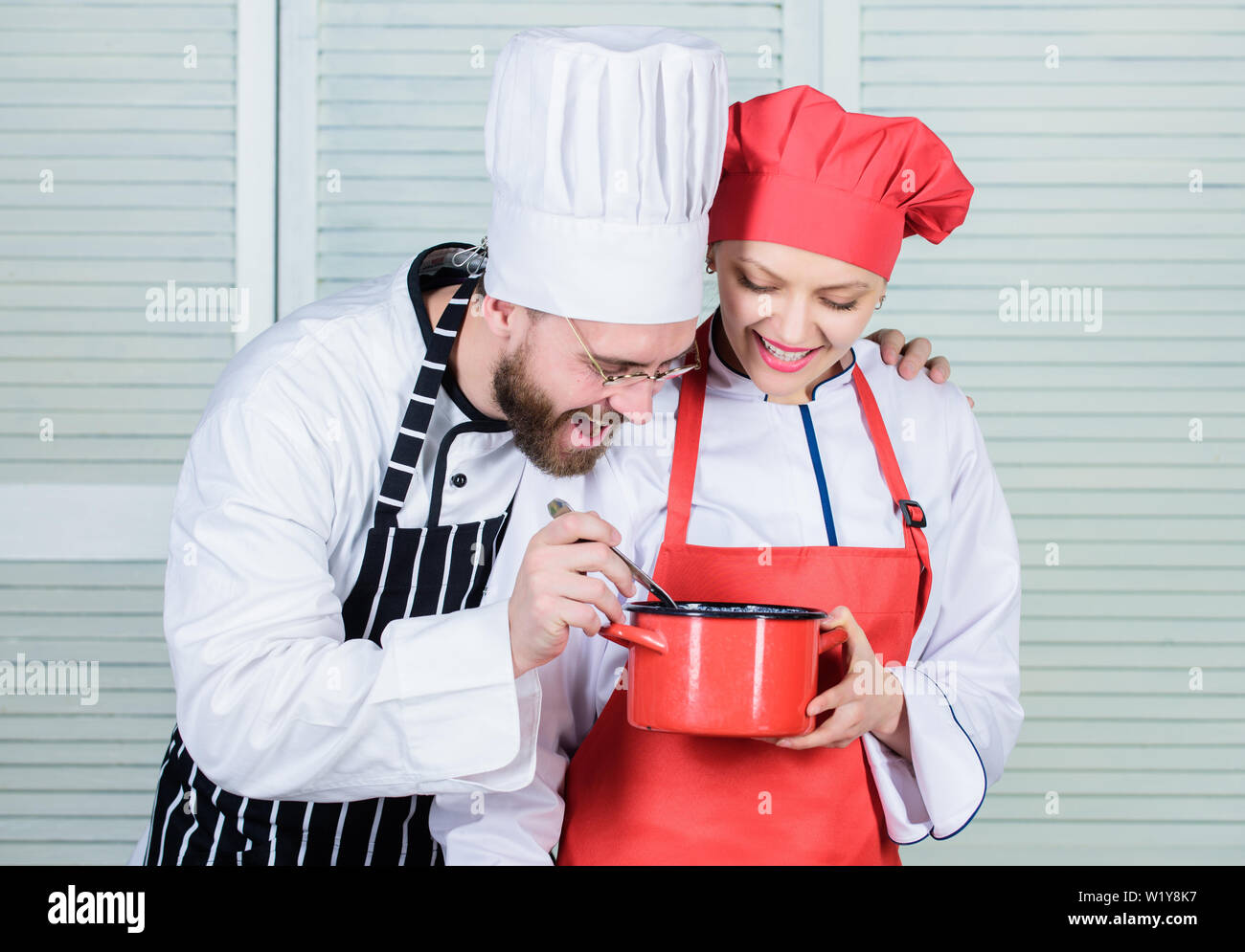 Need some help. Family cooking in kitchen. couple in love with perfect ...