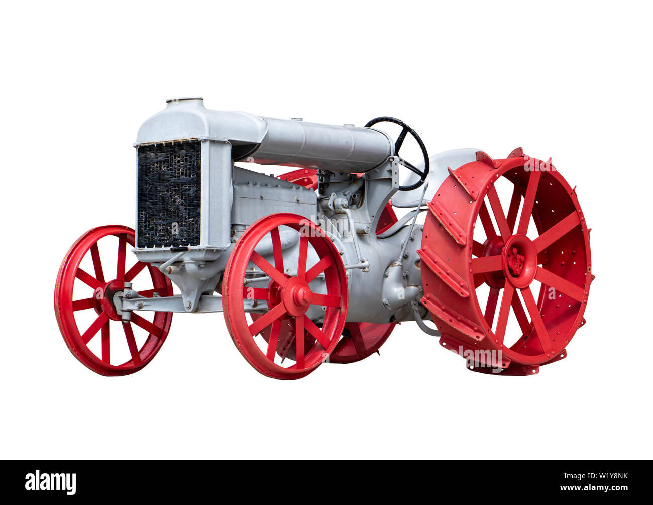 Historically tractor, isolated on a white background. Retro tractor in ...