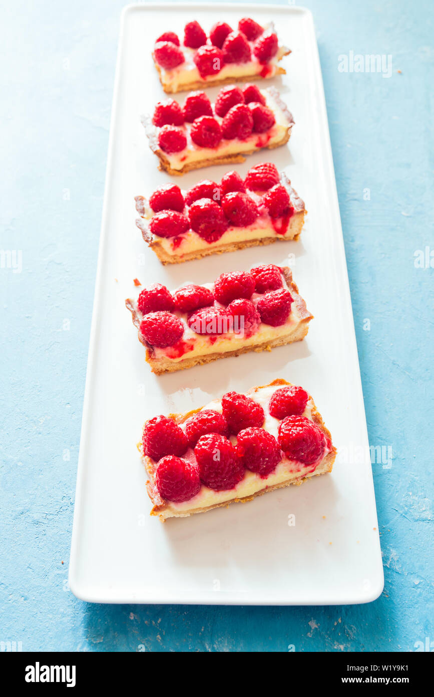 Raspberries rectangular shaped tart, top view, white background Stock ...