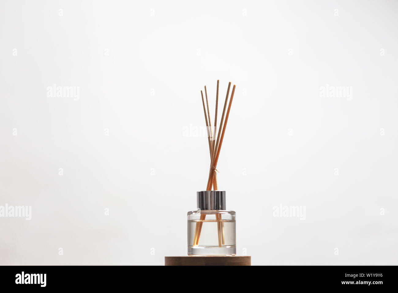bottle of fragrance diffuser with sticks isolated . air freshener . art ...