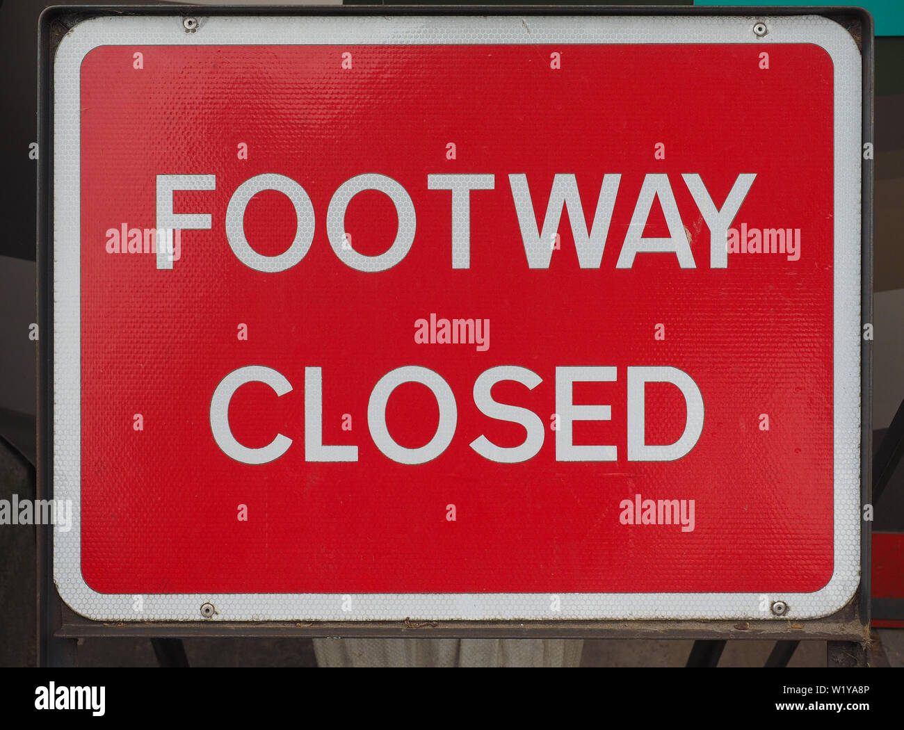 footway closed sign in white over red Stock Photo - Alamy