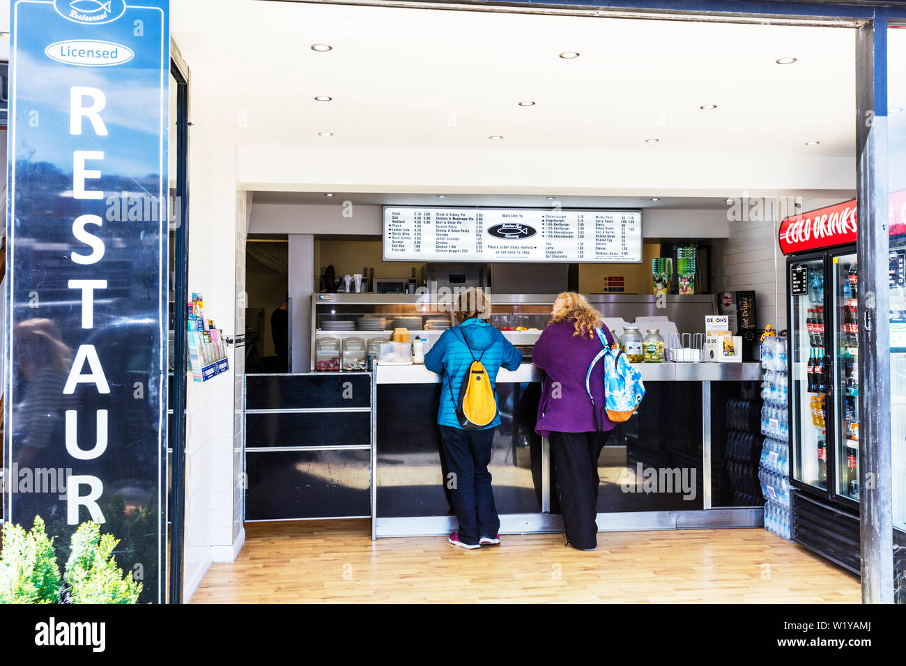 Ordering fish and chips, chip ship Brixham, fish and chips Brixham ...