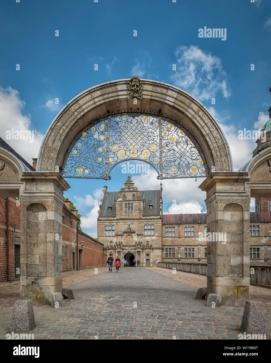 HILLEROD, DENMARK - MAY 18, 2019: Tourists at Frederiksborg castle, one ...