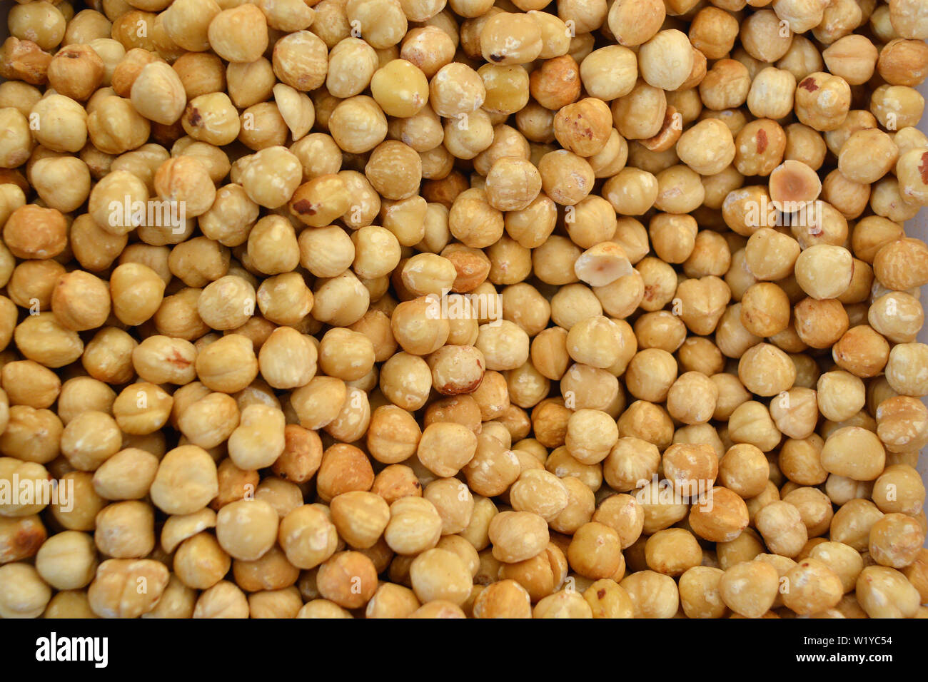 Texture of shelled hazelnuts in flat lay angle Stock Photo - Alamy