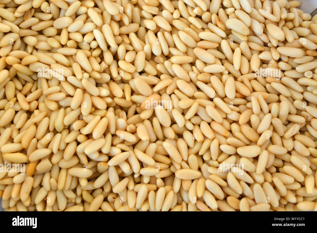 Texture of shelled pine nuts in flat lay angle Stock Photo - Alamy