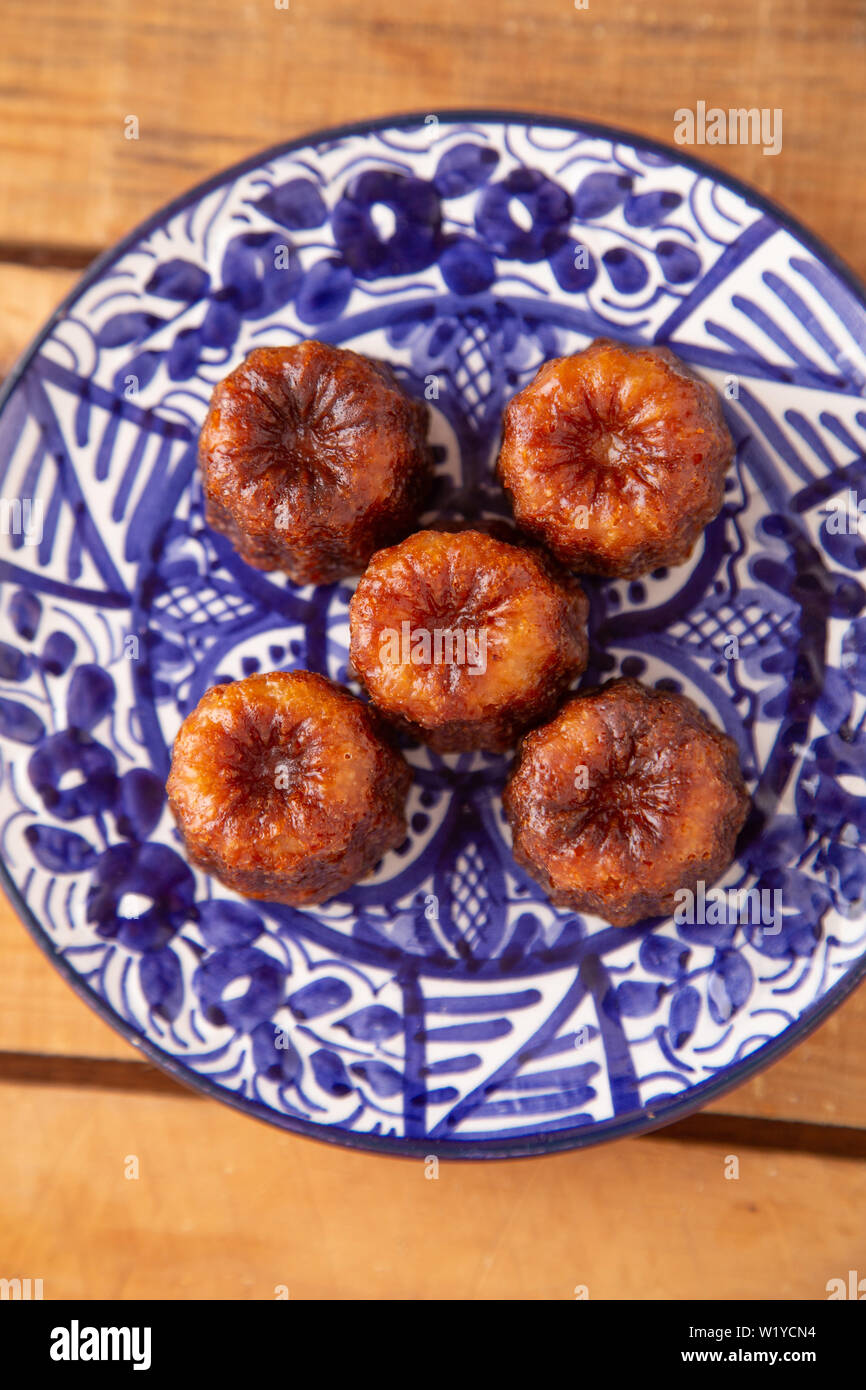 French pastry Caneles de bordeaux rum and vanilla flavor thick ...