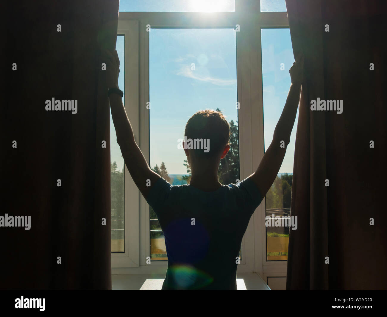 Hand opening curtain hi-res stock photography and images - Alamy