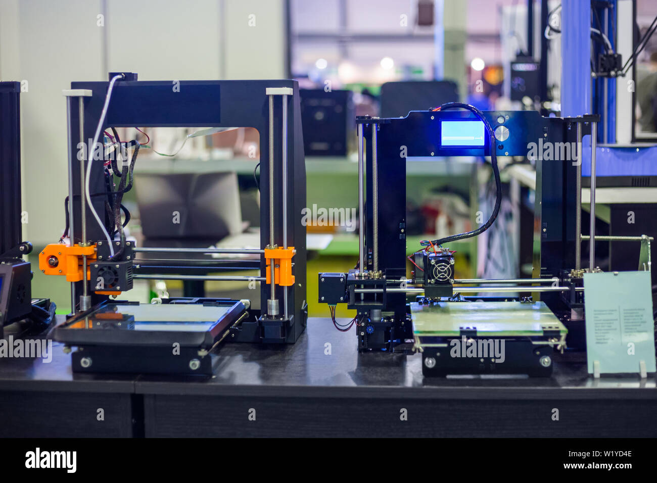 Three dimensional 3D printers during work at modern technology ...