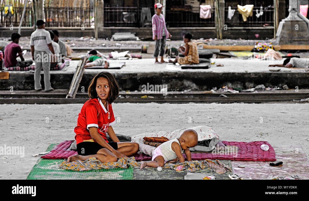 jakarta, indonesia - 2008.12.08: homeless people living on the ...