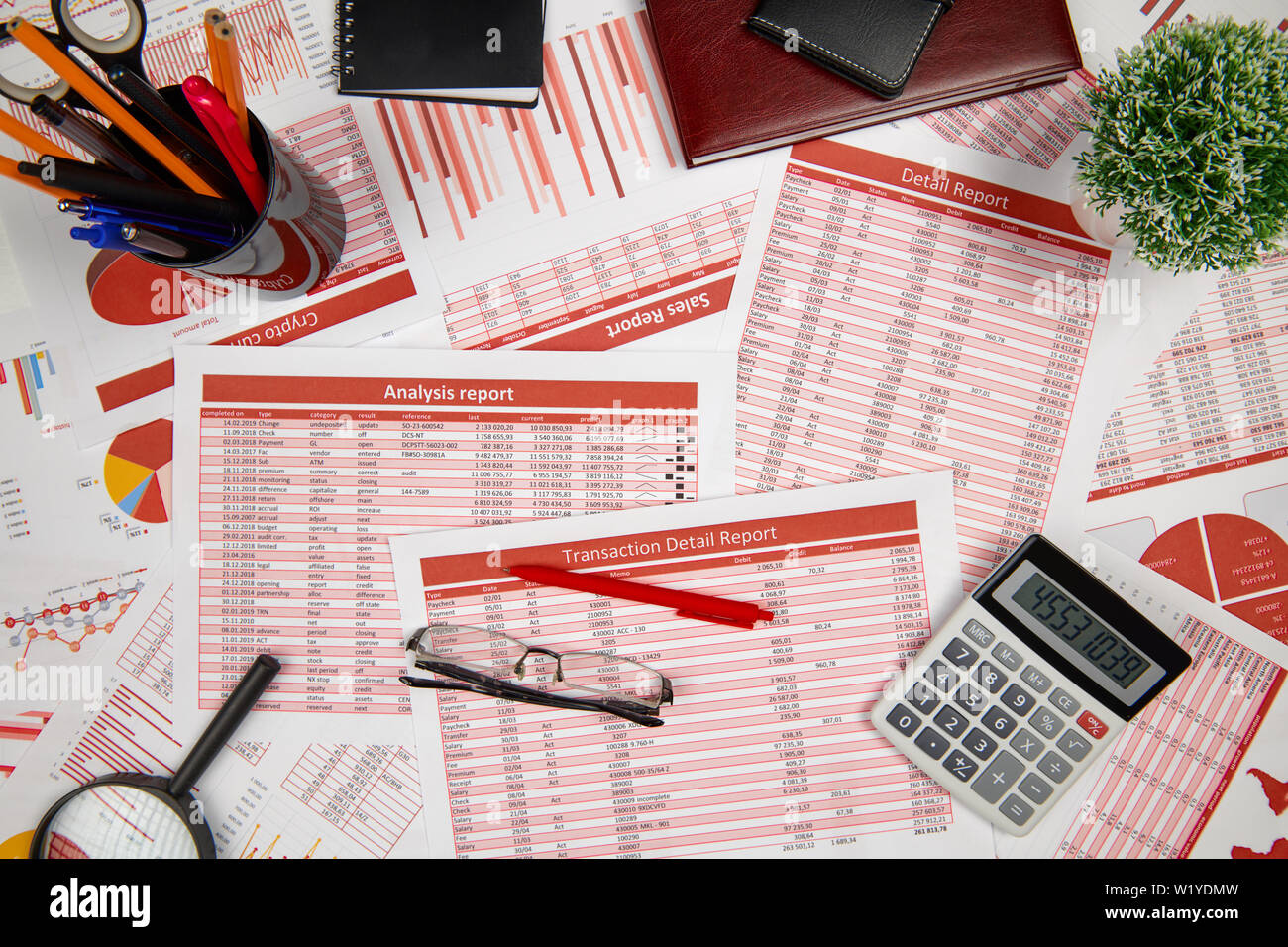 Business reports, data tables and charts - directly above view of ...