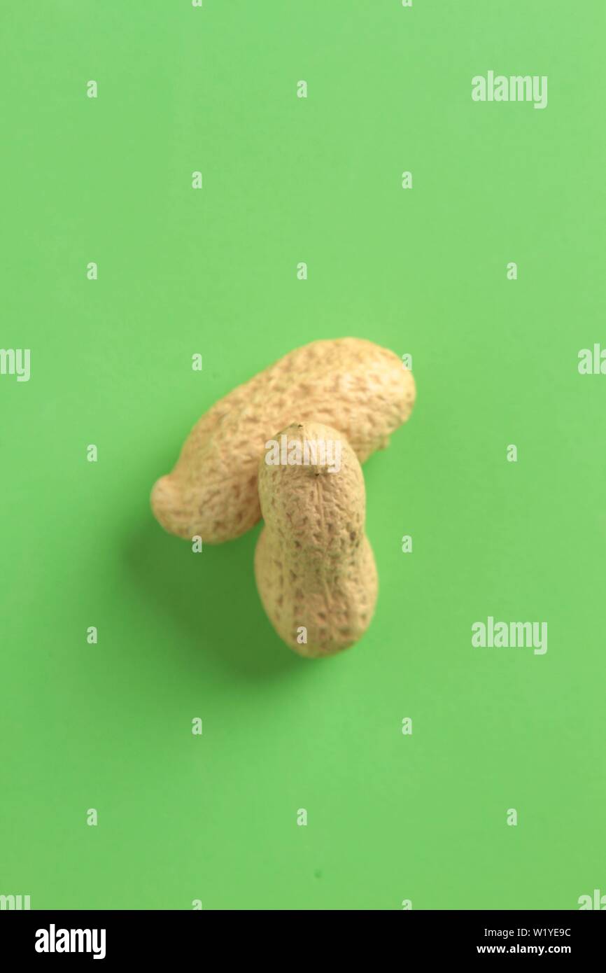peanuts in colorful background Stock Photo - Alamy